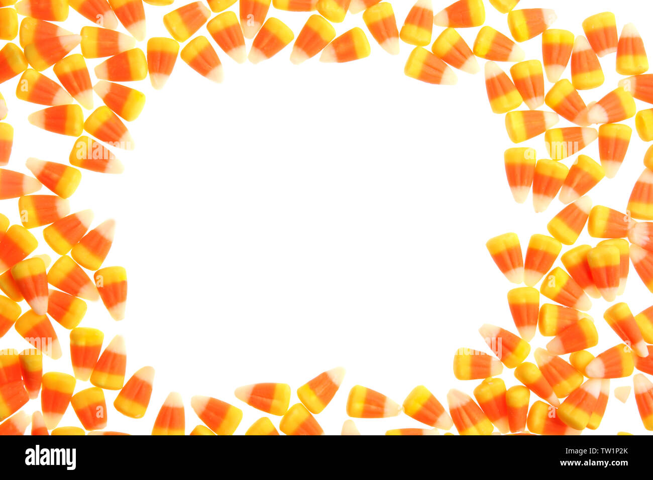 Colorful Halloween candy corns on white background Stock Photo - Alamy