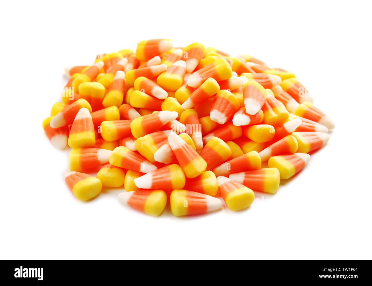 Colorful Halloween candy corns on white background Stock Photo - Alamy