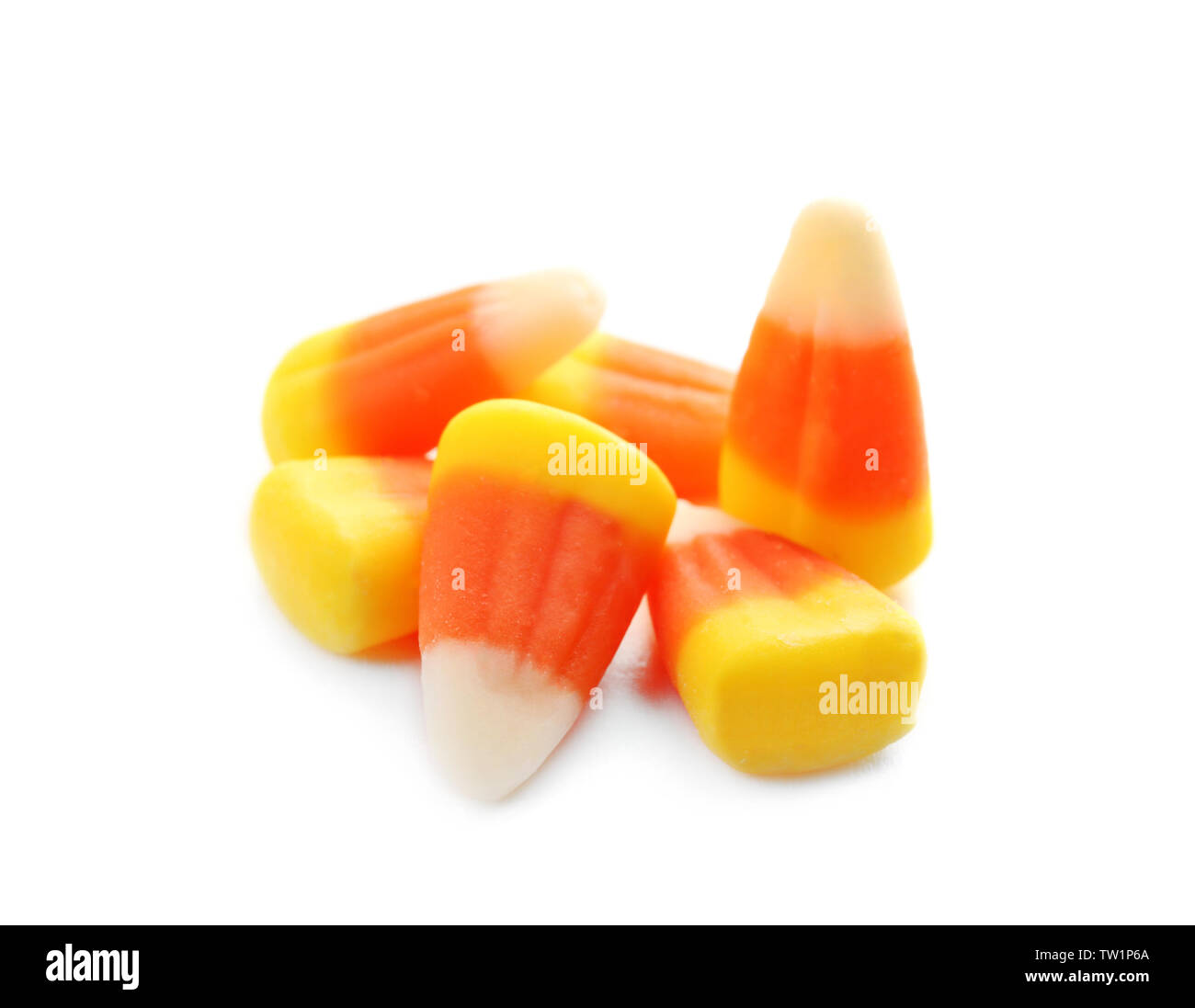 Colorful Halloween candy corns on white background Stock Photo - Alamy