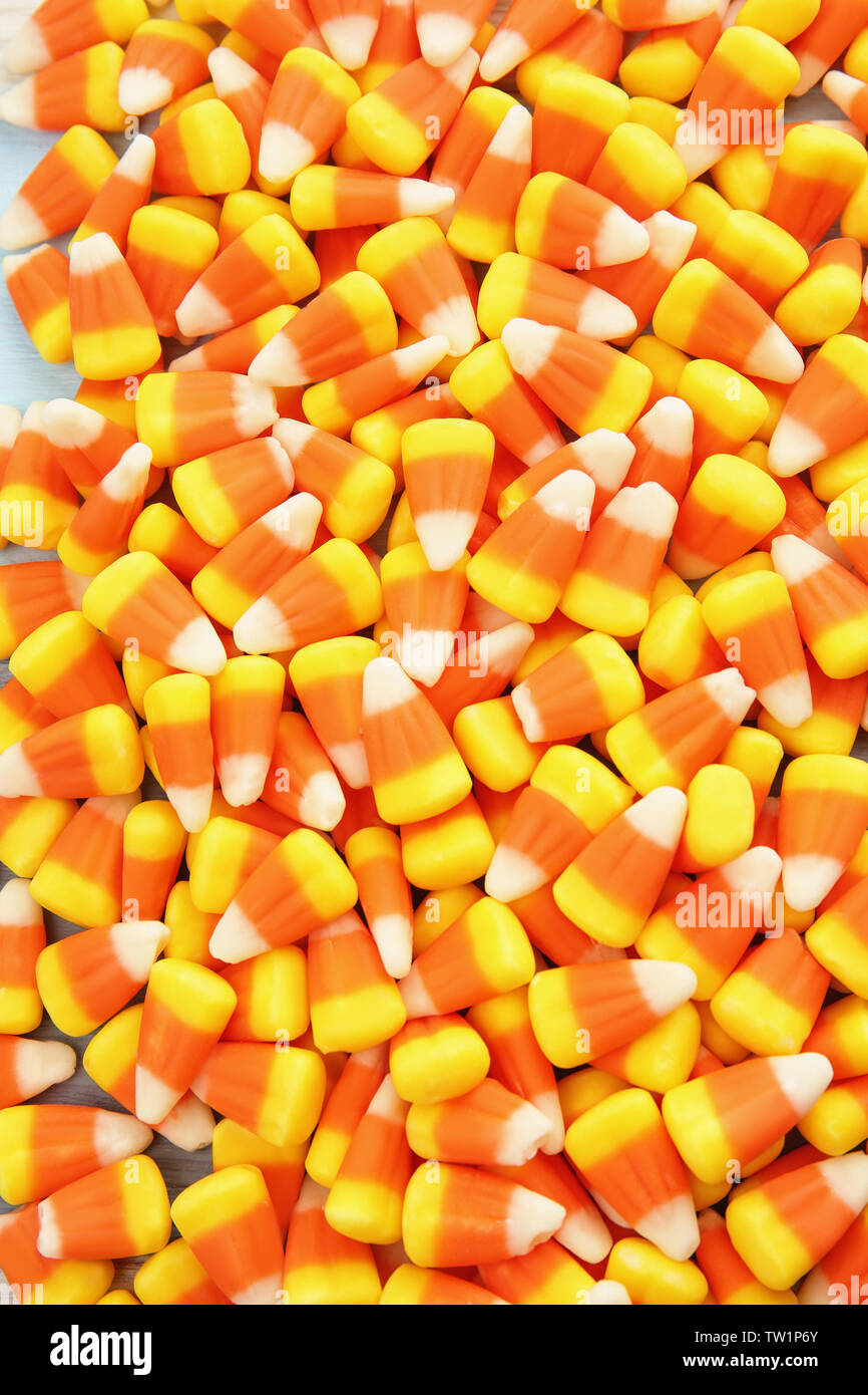 Colorful Halloween candy corns background Stock Photo - Alamy