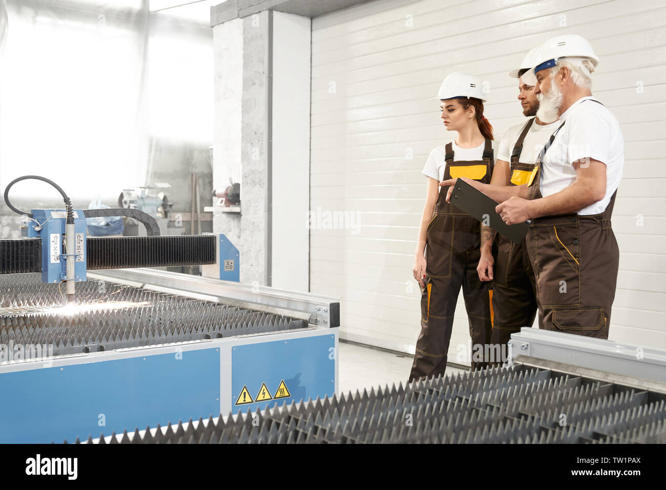 Uniforms manufacturing hi-res stock photography and images - Alamy
