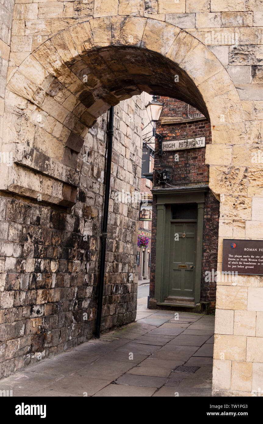 Medieval stone archway through the city walls at the site of the Roman ...