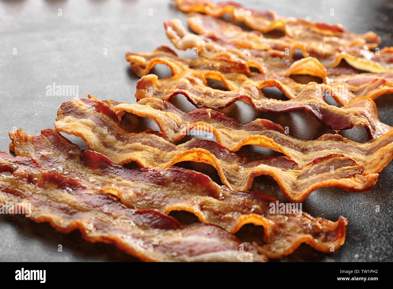 Strips of fried bacon, closeup Stock Photo - Alamy