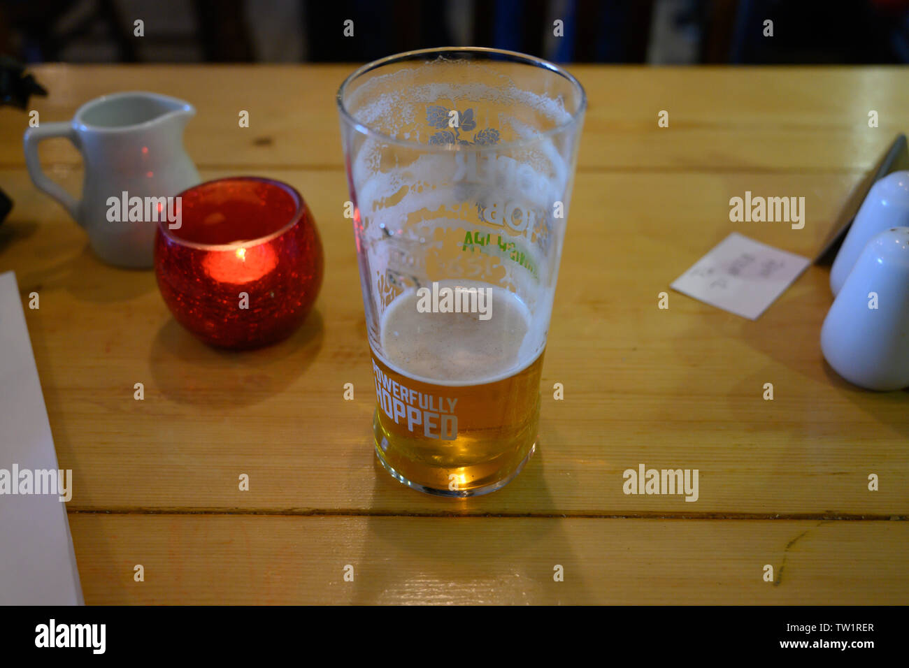 beer glass nearly empty Stock Photo - Alamy