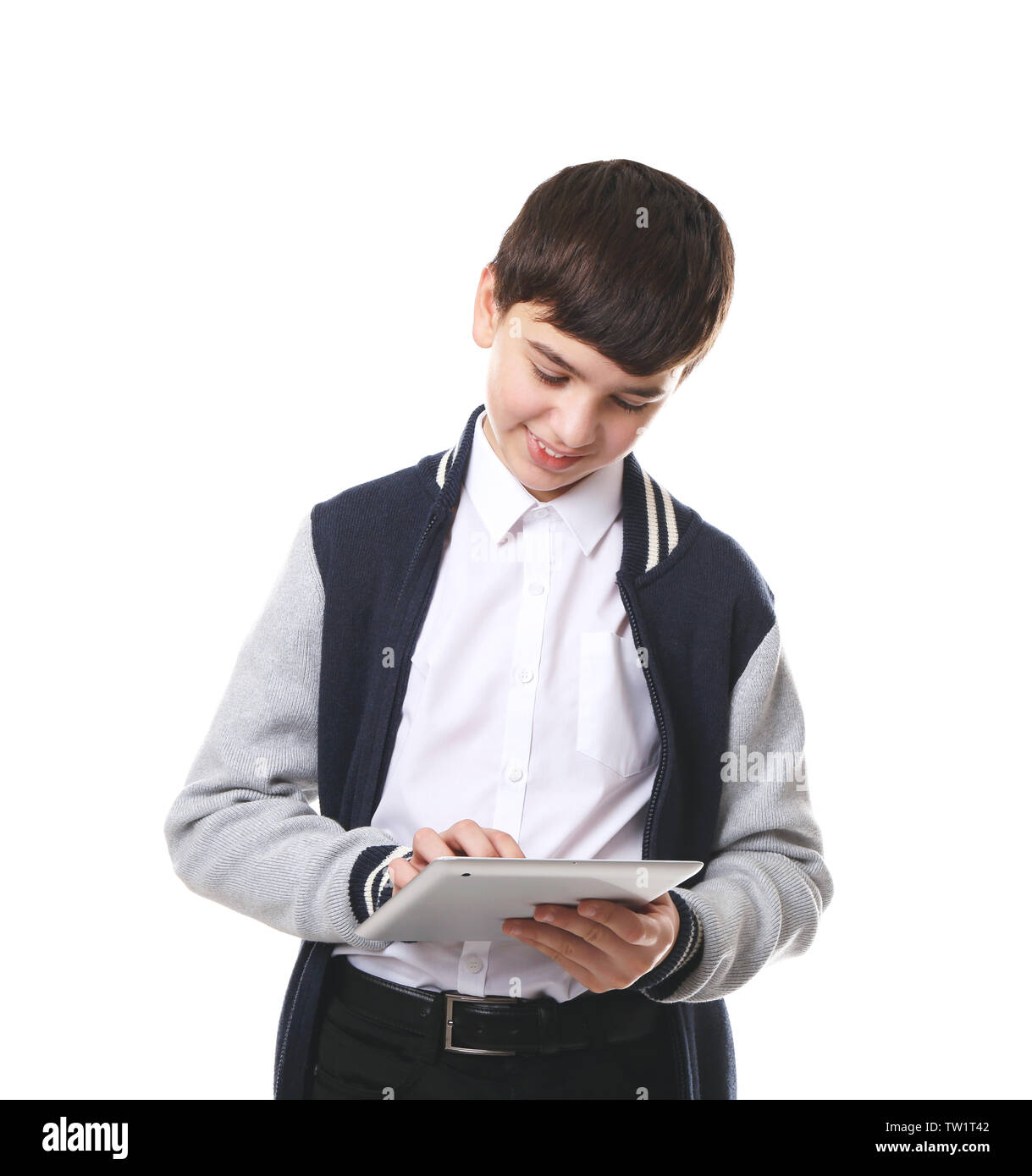 Cute boy in school uniform on white background Stock Photo - Alamy