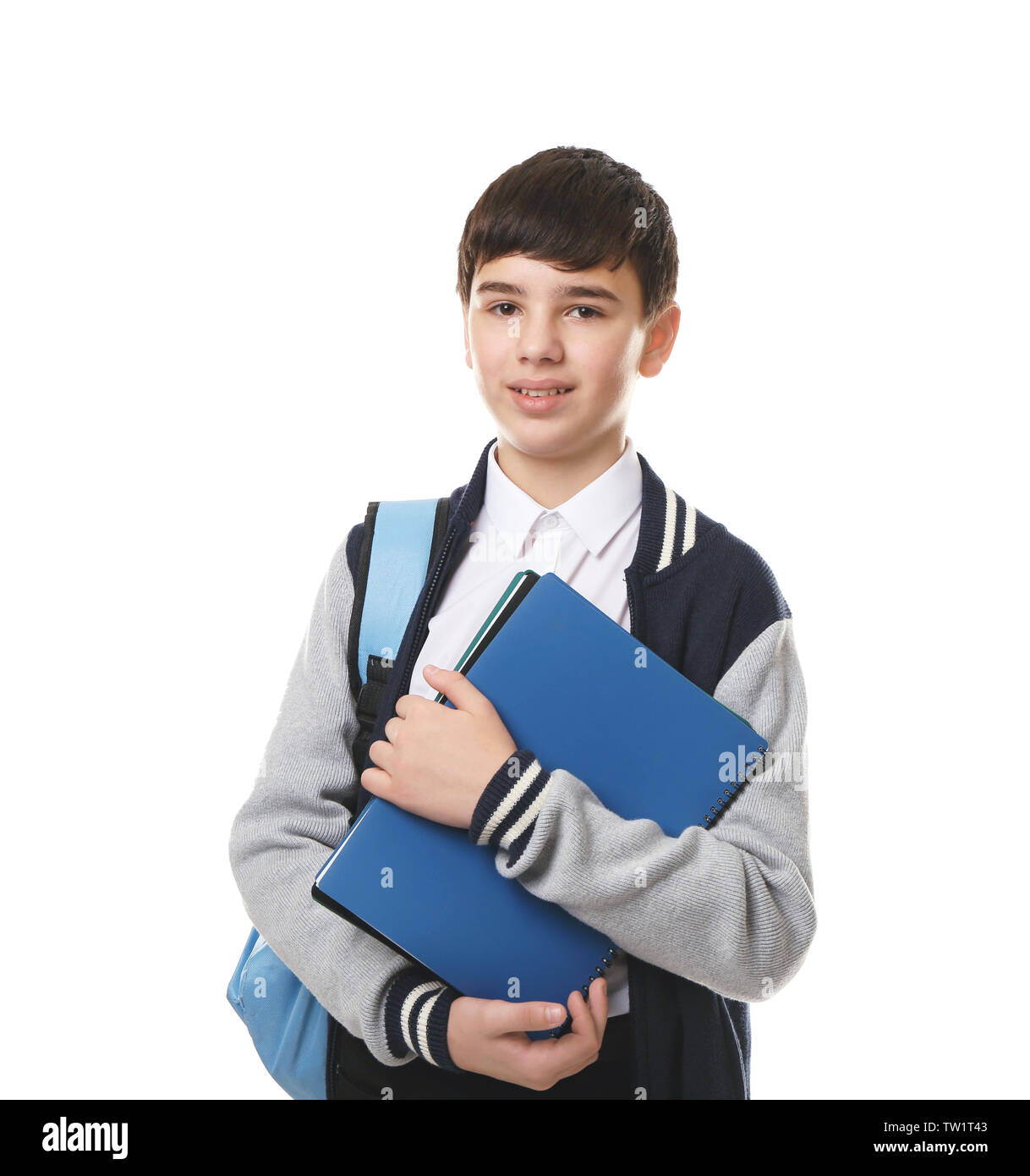 Cute boy in school uniform on white background Stock Photo - Alamy