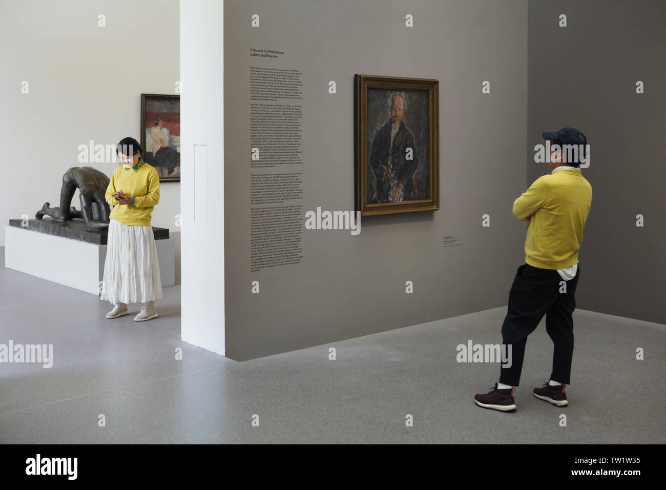 Visitor in front of the painting 'Portrait of Heinrich Thannhauser' by ...