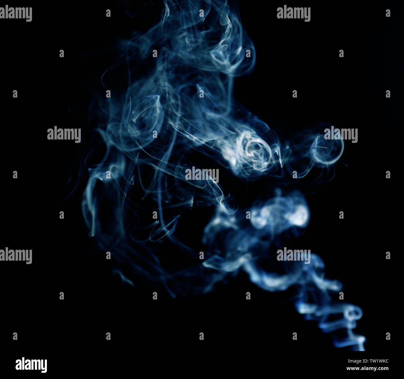 Swirl of white smoke on black background Stock Photo - Alamy
