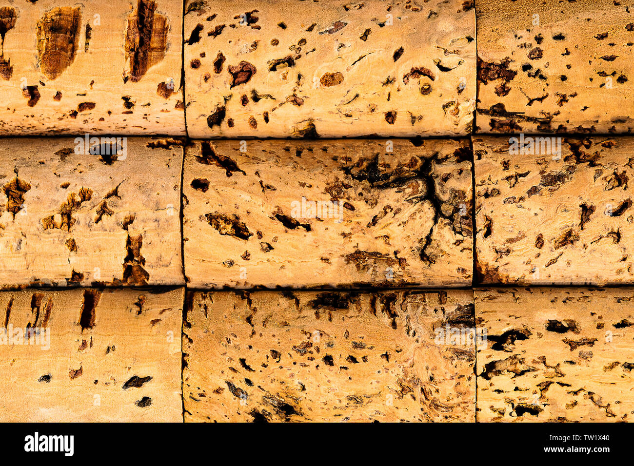 9 wine corks in 3 rows from the side horizontally in the frame. Each of ...