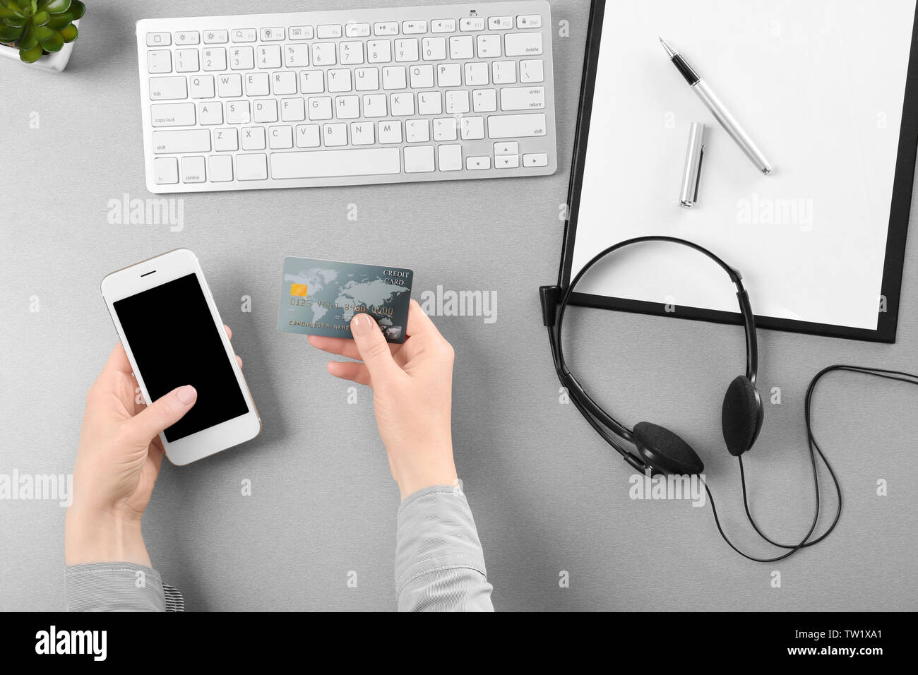 Hands of technical support agent at workplace Stock Photo - Alamy