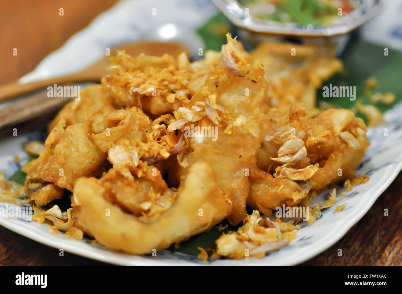 deep fish dish, fried fish with sauce Stock Photo - Alamy