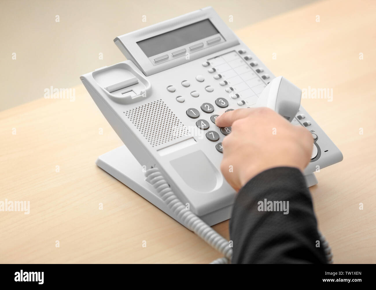Young man dialing number talking hi-res stock photography and images ...