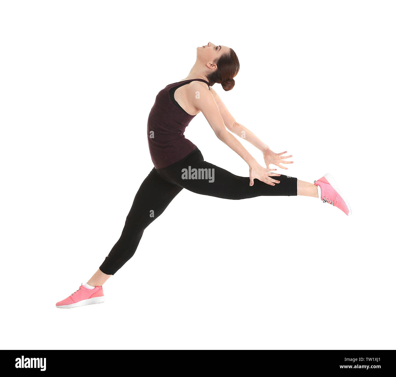 Young beautiful fitness girl training on white background Stock Photo ...