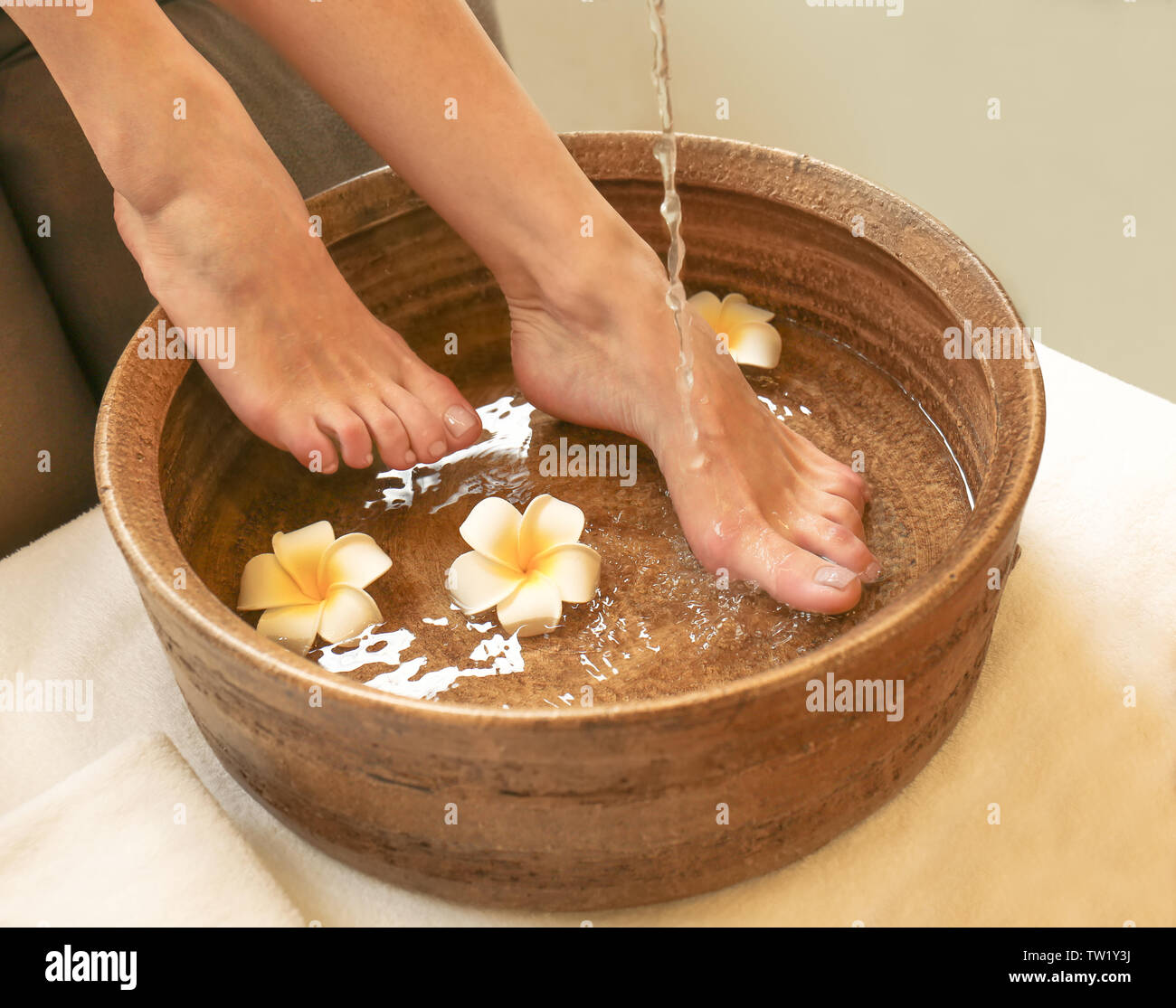 Female feet treatment in spa salon Stock Photo - Alamy