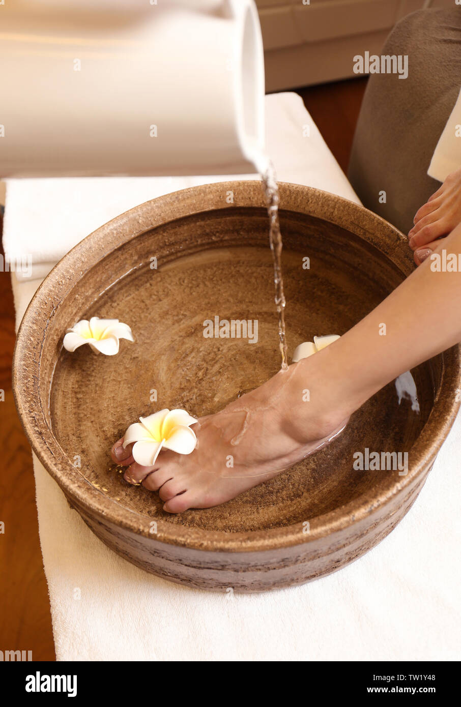 Female feet treatment in spa salon Stock Photo - Alamy