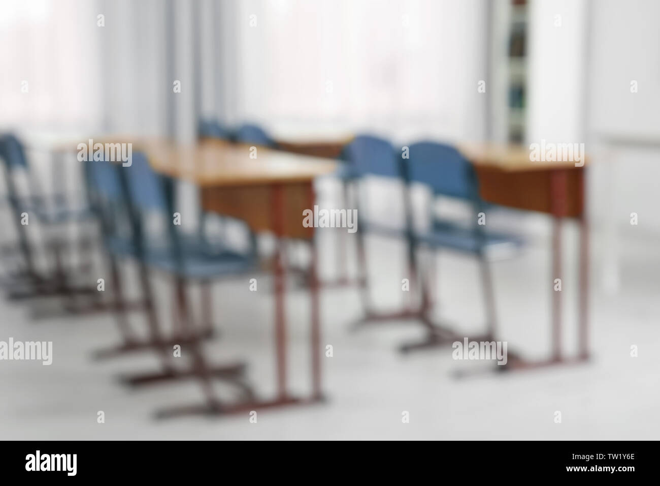 Blurred view of school classroom interior Stock Photo - Alamy