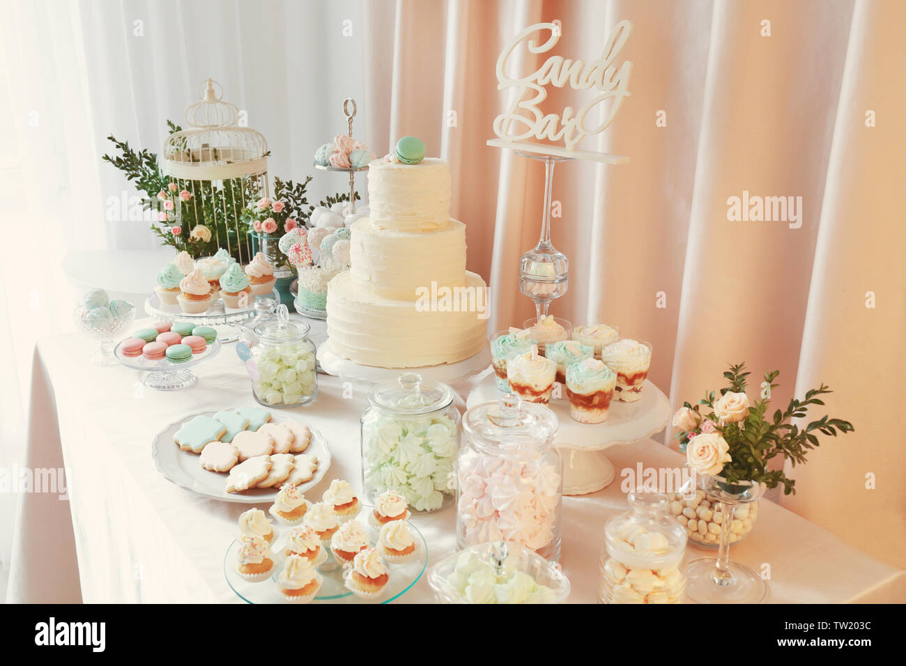 Candy bar. Table with different sweets for party Stock Photo - Alamy