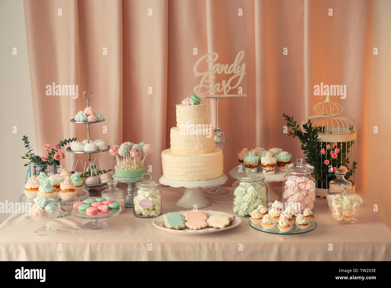 Candy bar. Table with different sweets for party Stock Photo - Alamy