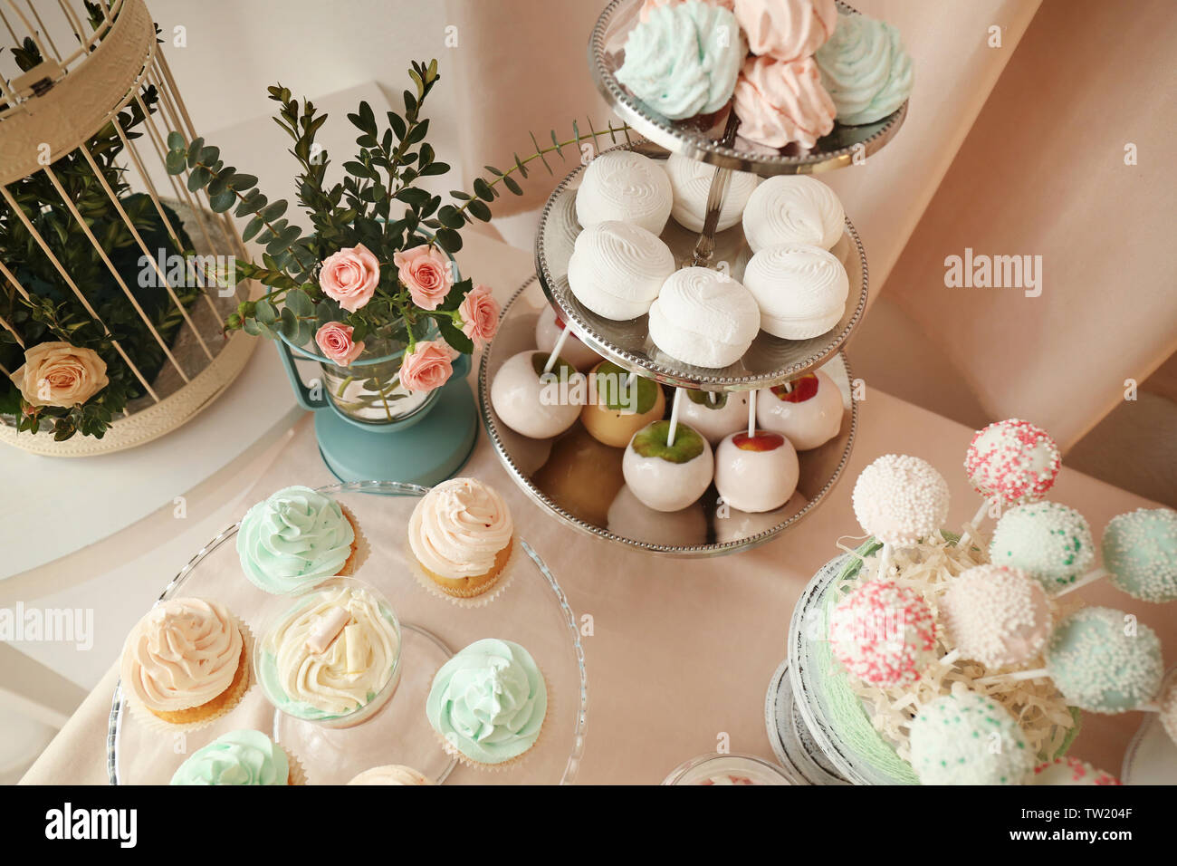 Candy bar. Table with different sweets for party Stock Photo - Alamy
