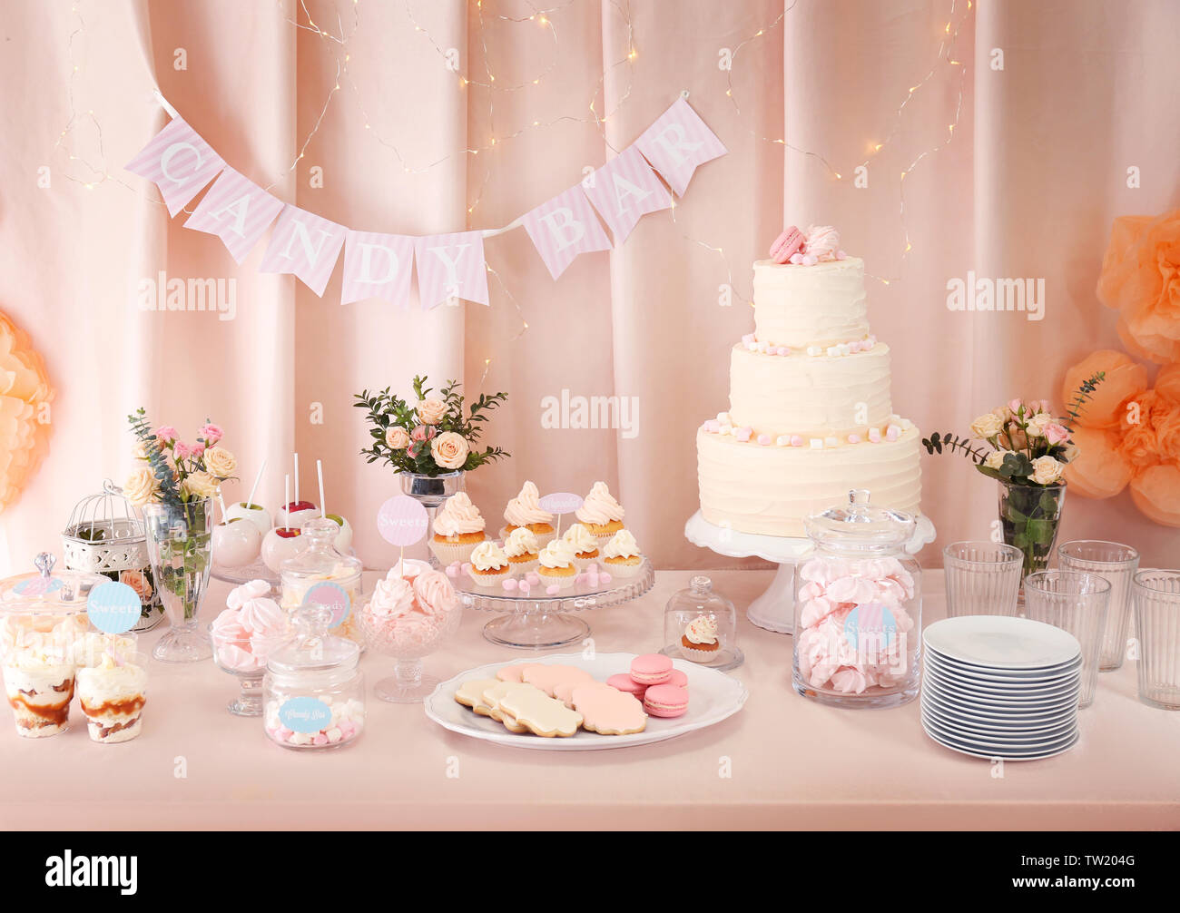 Candy bar. Table with different sweets for party Stock Photo - Alamy