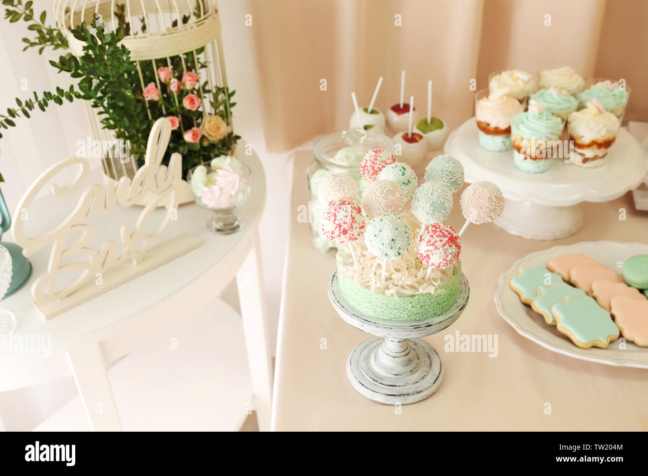 Candy bar. Table with different sweets for party Stock Photo - Alamy