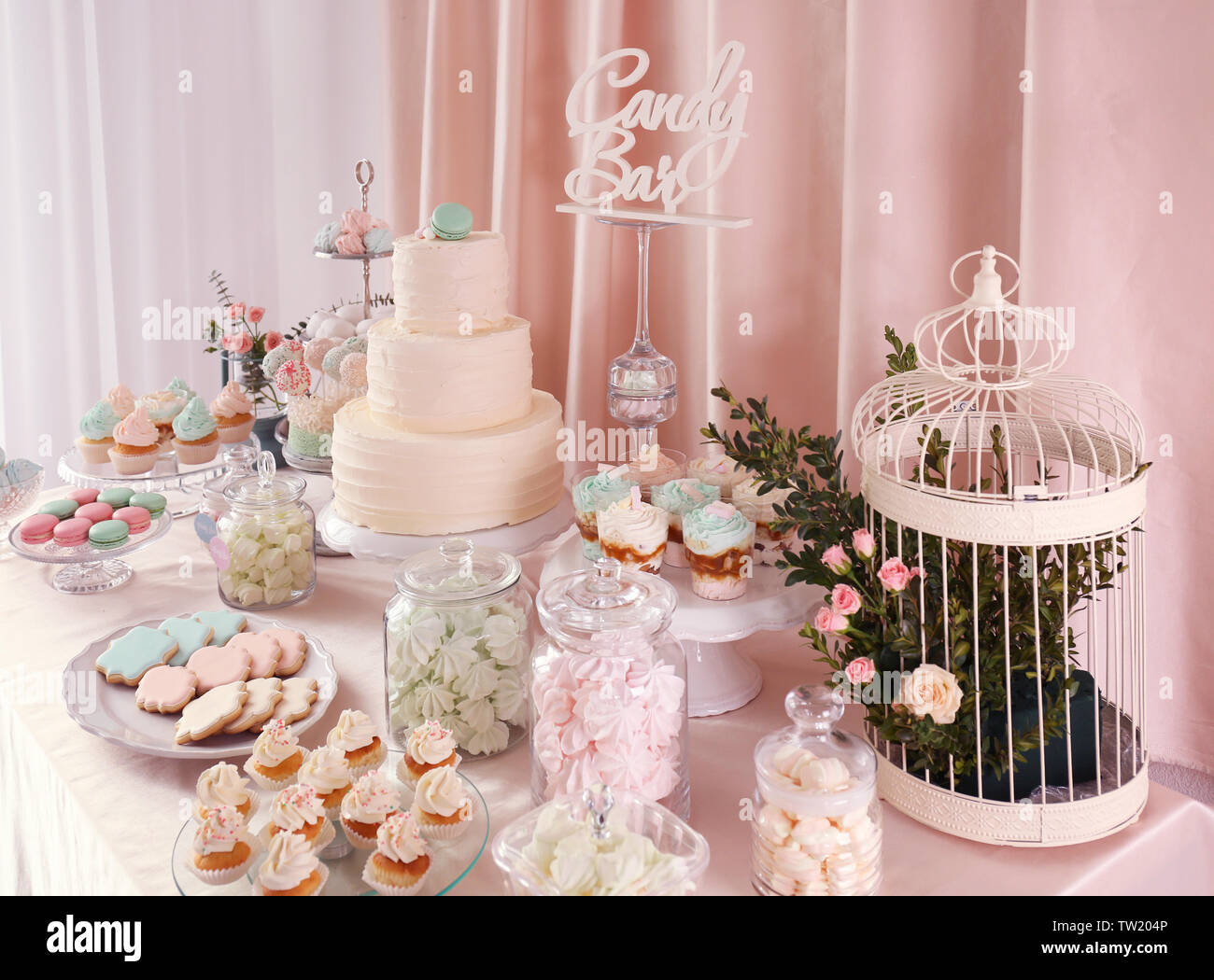 Candy bar. Table with different sweets for party Stock Photo - Alamy