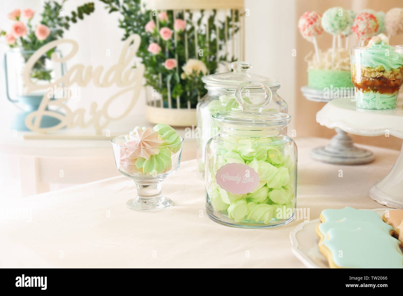 Candy bar. Table with different sweets for party Stock Photo - Alamy