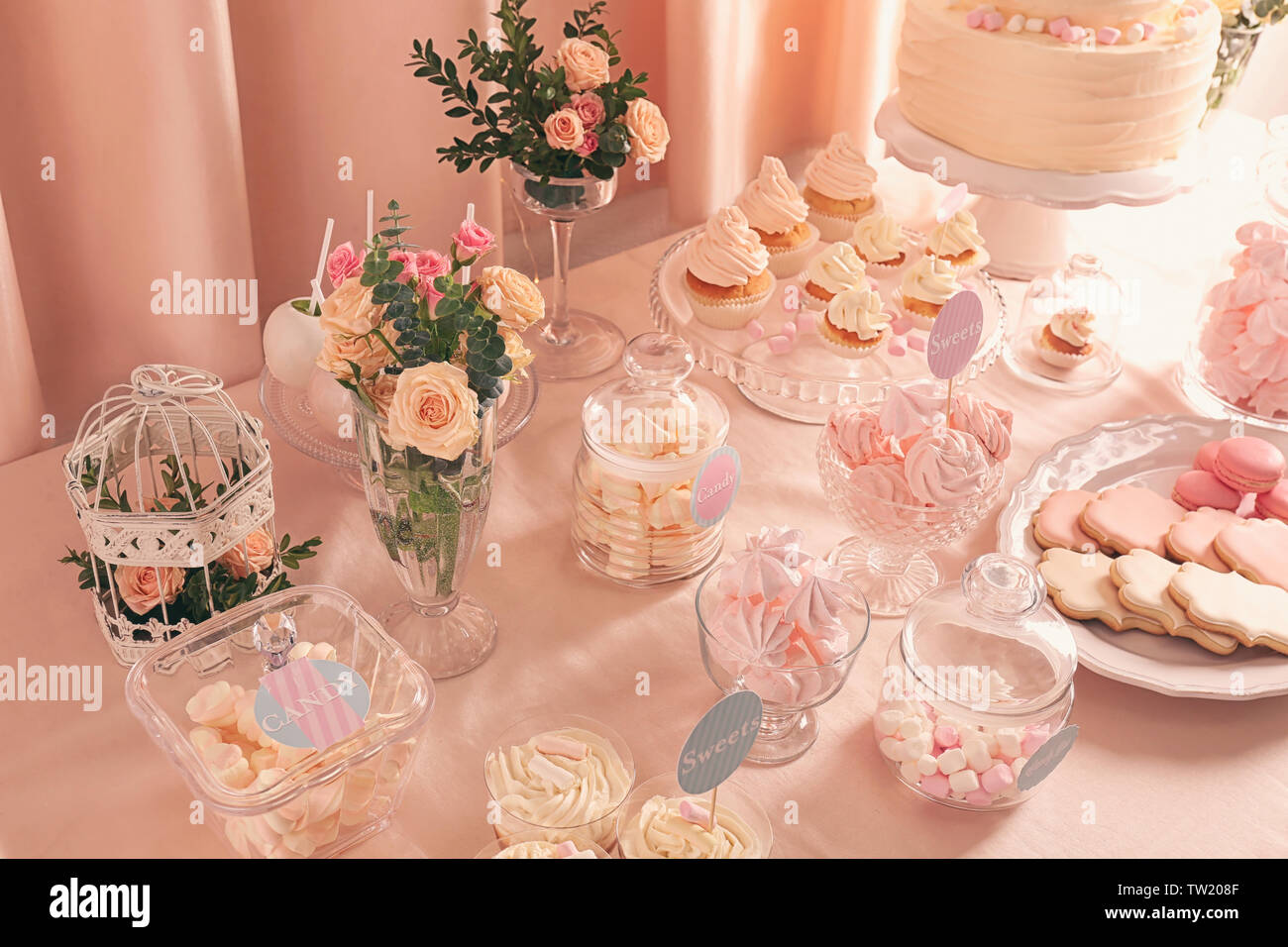Candy bar. Table with different sweets for party Stock Photo - Alamy