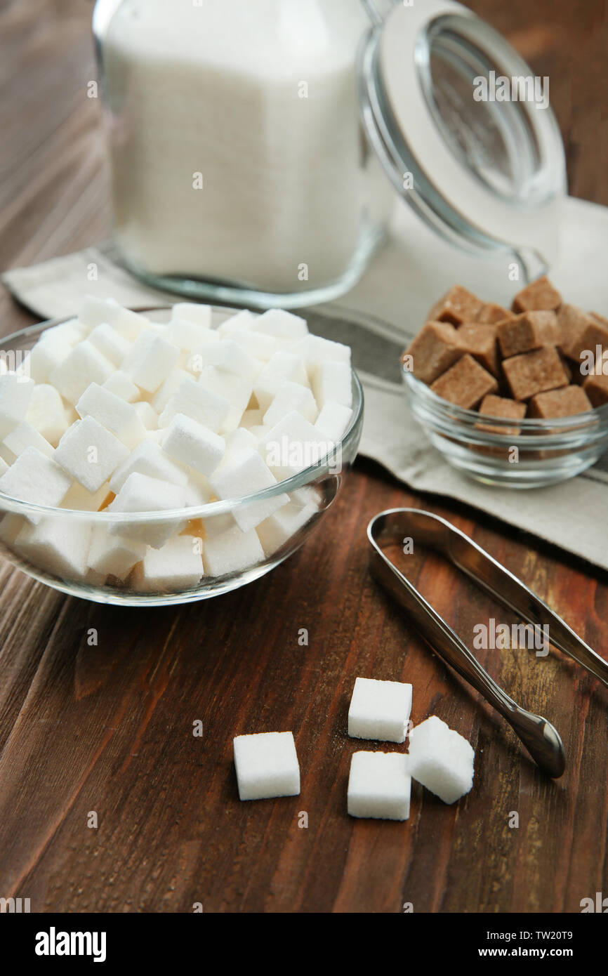Beautiful composition with sugar on wooden background Stock Photo - Alamy
