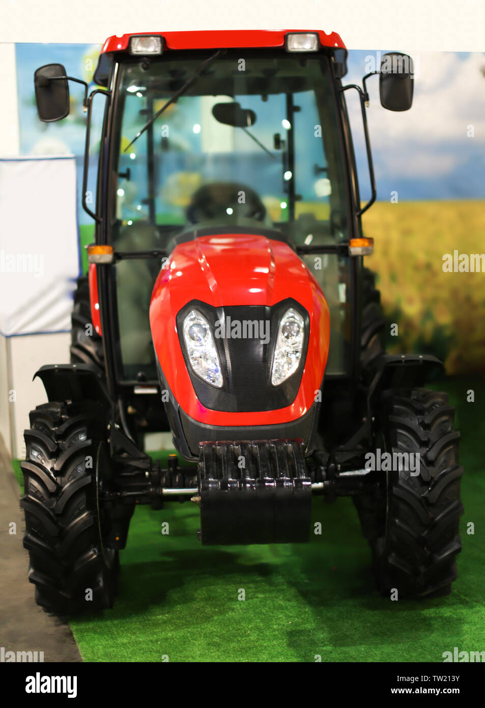 Modern tractor on agricultural exhibition Stock Photo - Alamy