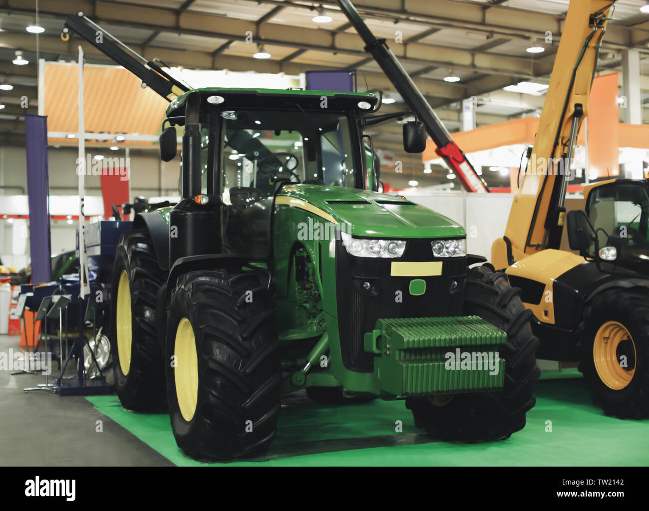 Modern tractor on agricultural exhibition Stock Photo - Alamy