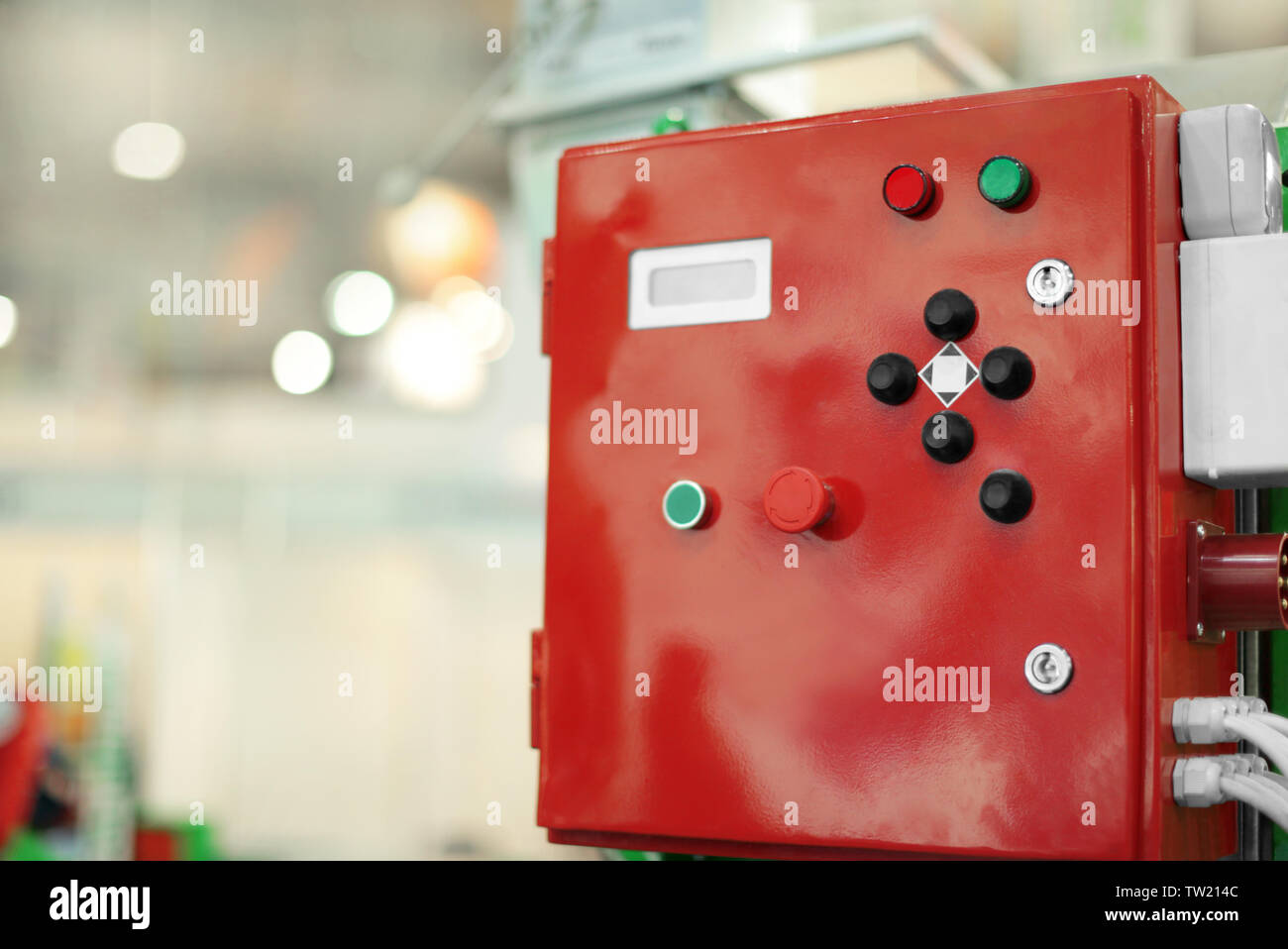 Electric control box on blurred background Stock Photo - Alamy