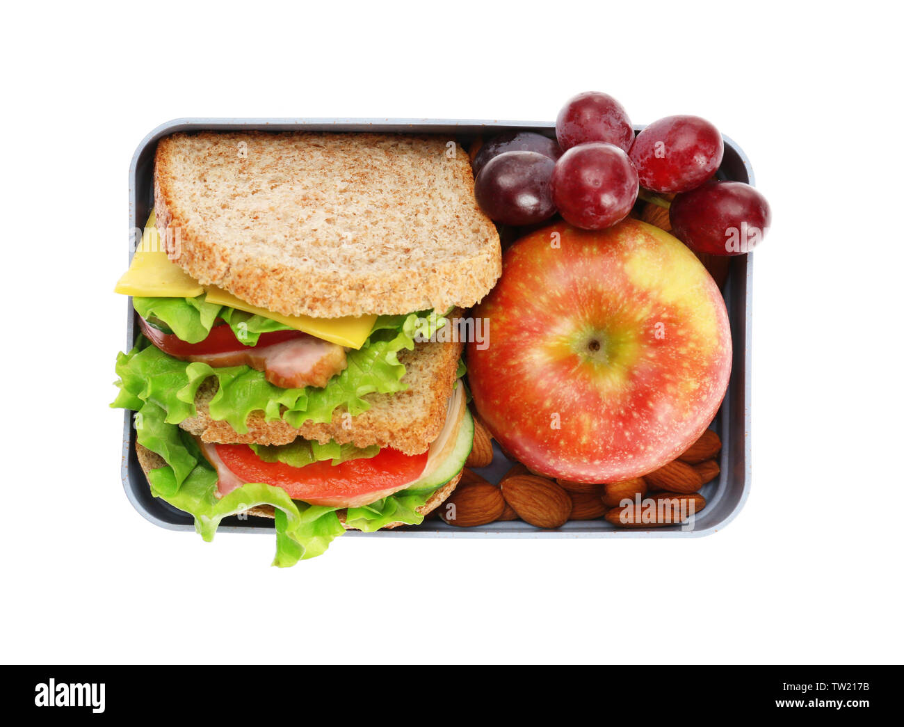 Lunch box with delicious food on white background Stock Photo - Alamy