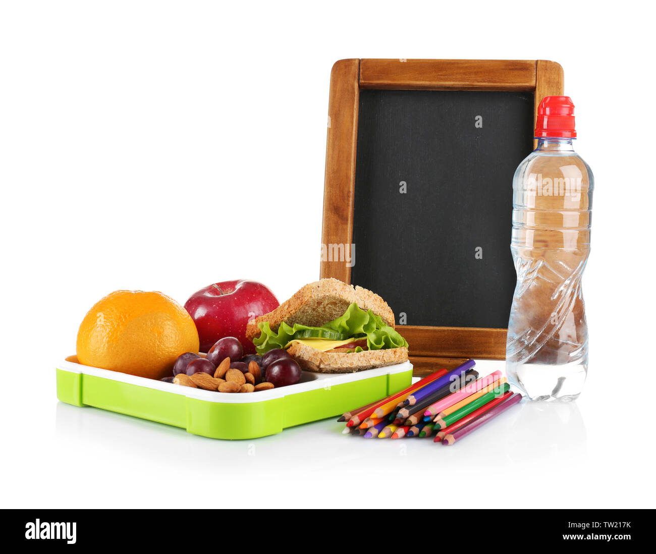 Lunch box with food and stationery on white background Stock Photo - Alamy
