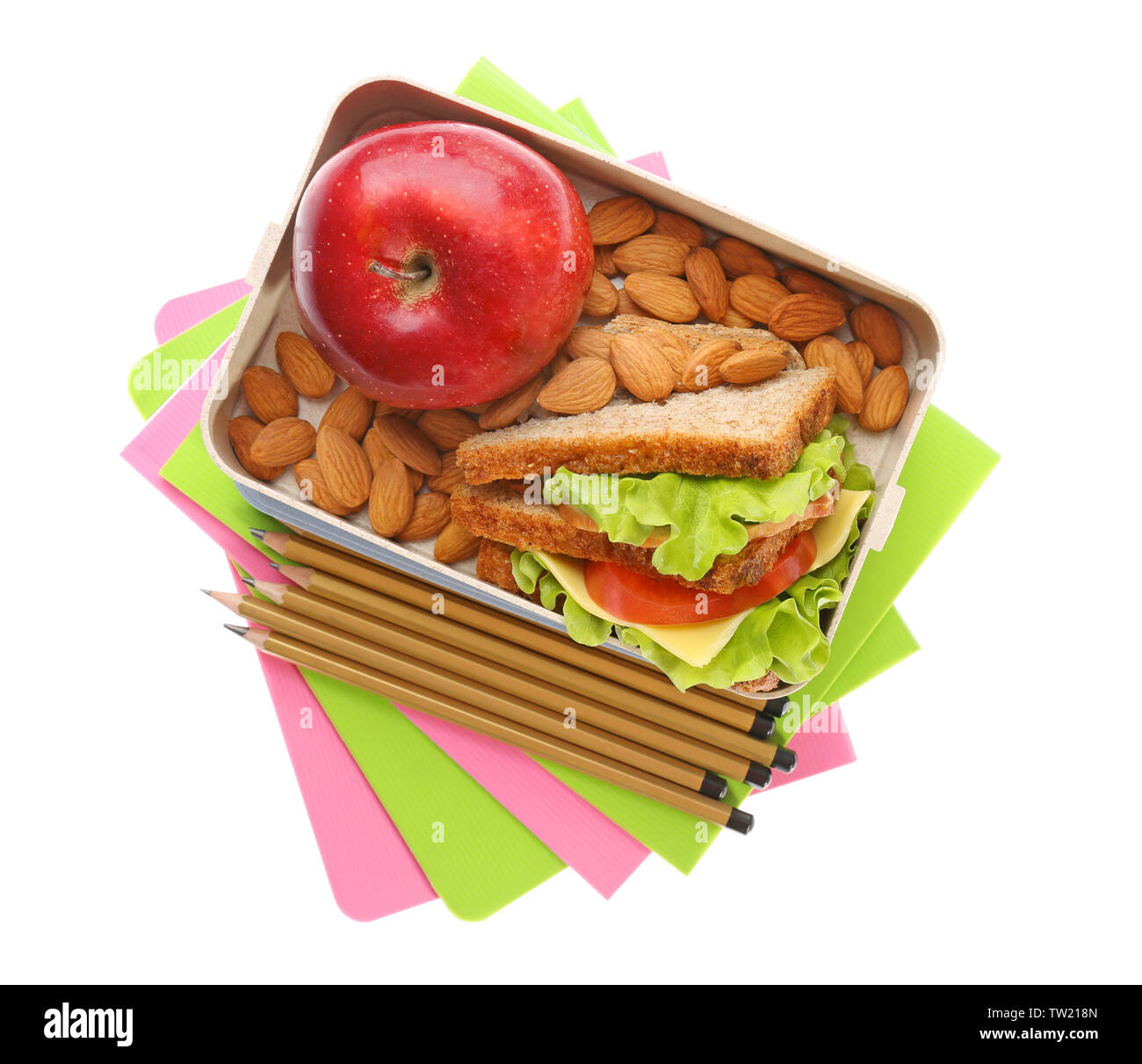 Lunch box with food and stationery on white background Stock Photo - Alamy