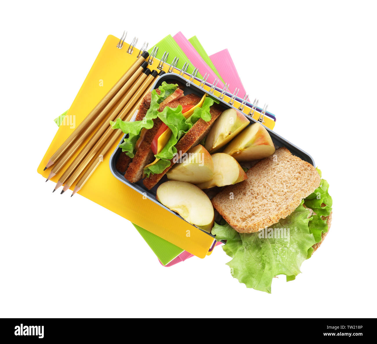 Lunch box with food and stationery on white background Stock Photo - Alamy