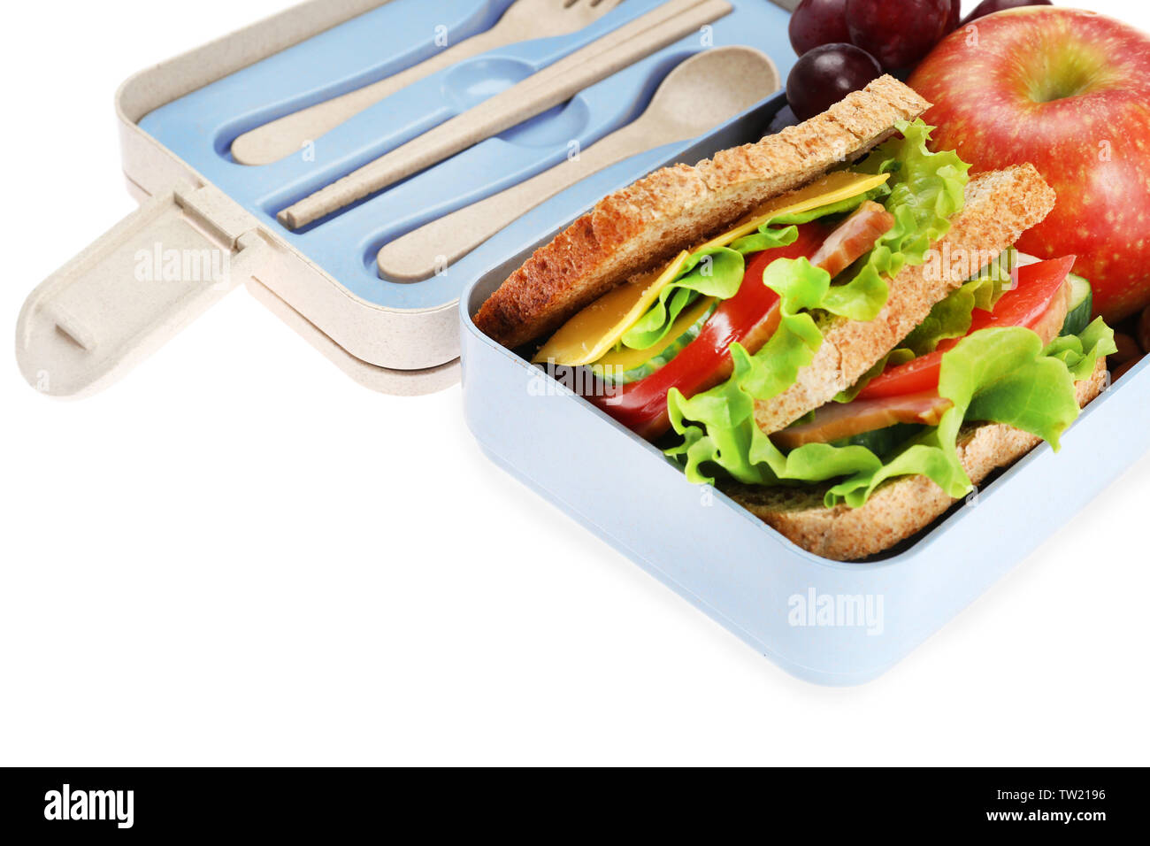 Lunch box with delicious food on white background Stock Photo - Alamy