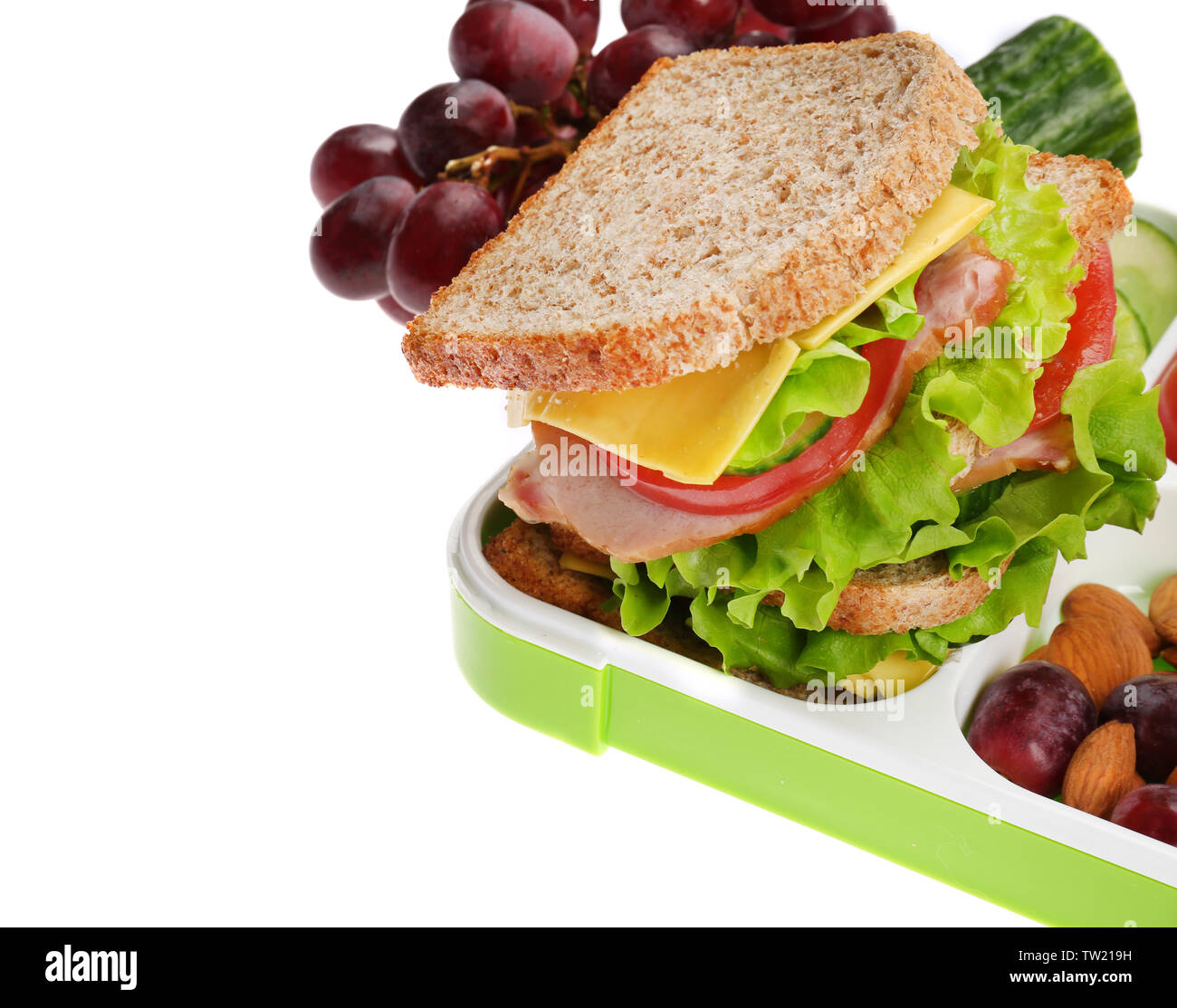 Lunch box with delicious food on white background Stock Photo - Alamy