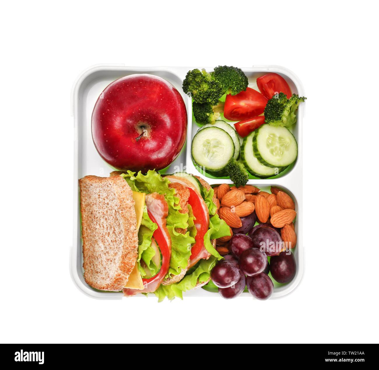 Lunch box with delicious food on white background Stock Photo - Alamy