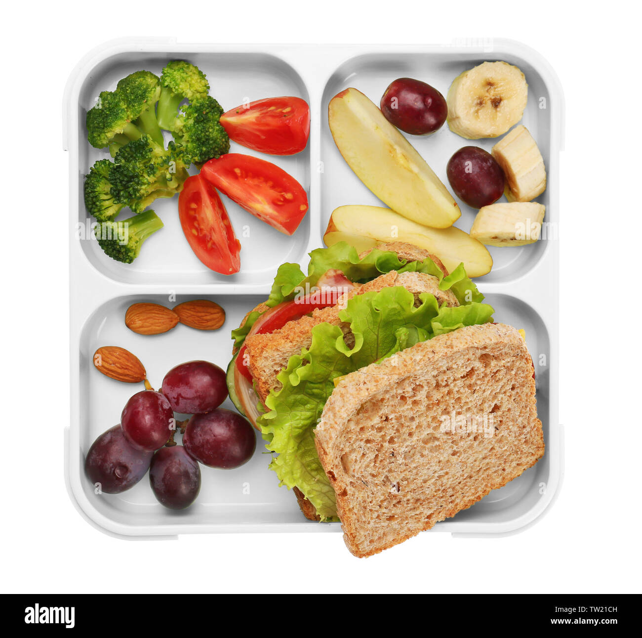 Lunch box with delicious food on white background Stock Photo - Alamy