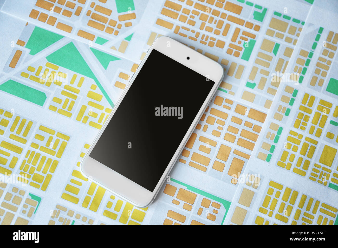 Smartphone on navigation map background Stock Photo - Alamy