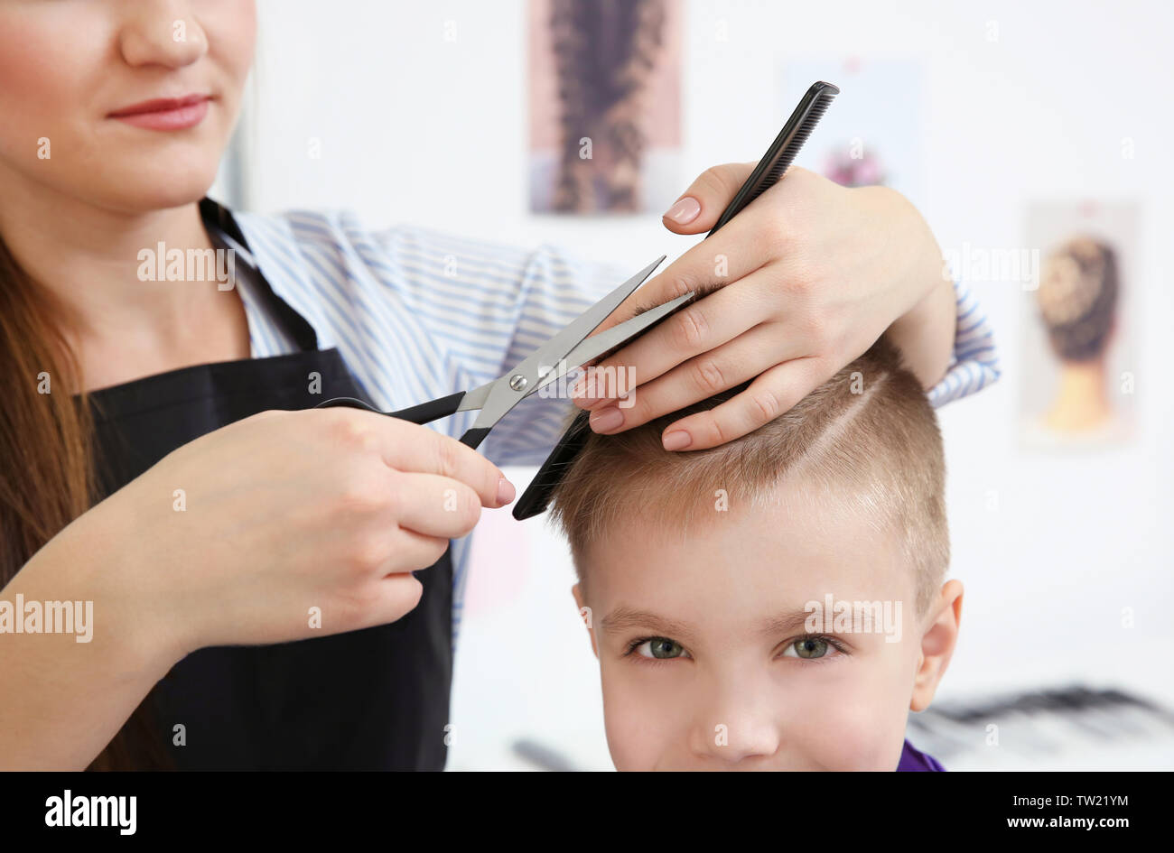 Cute little boy in hairdressing salon Stock Photo - Alamy