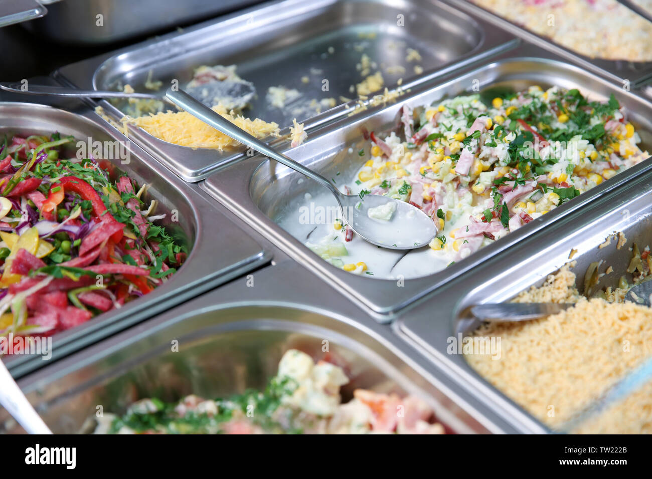 Steel self service trays filled with delicious food Stock Photo - Alamy