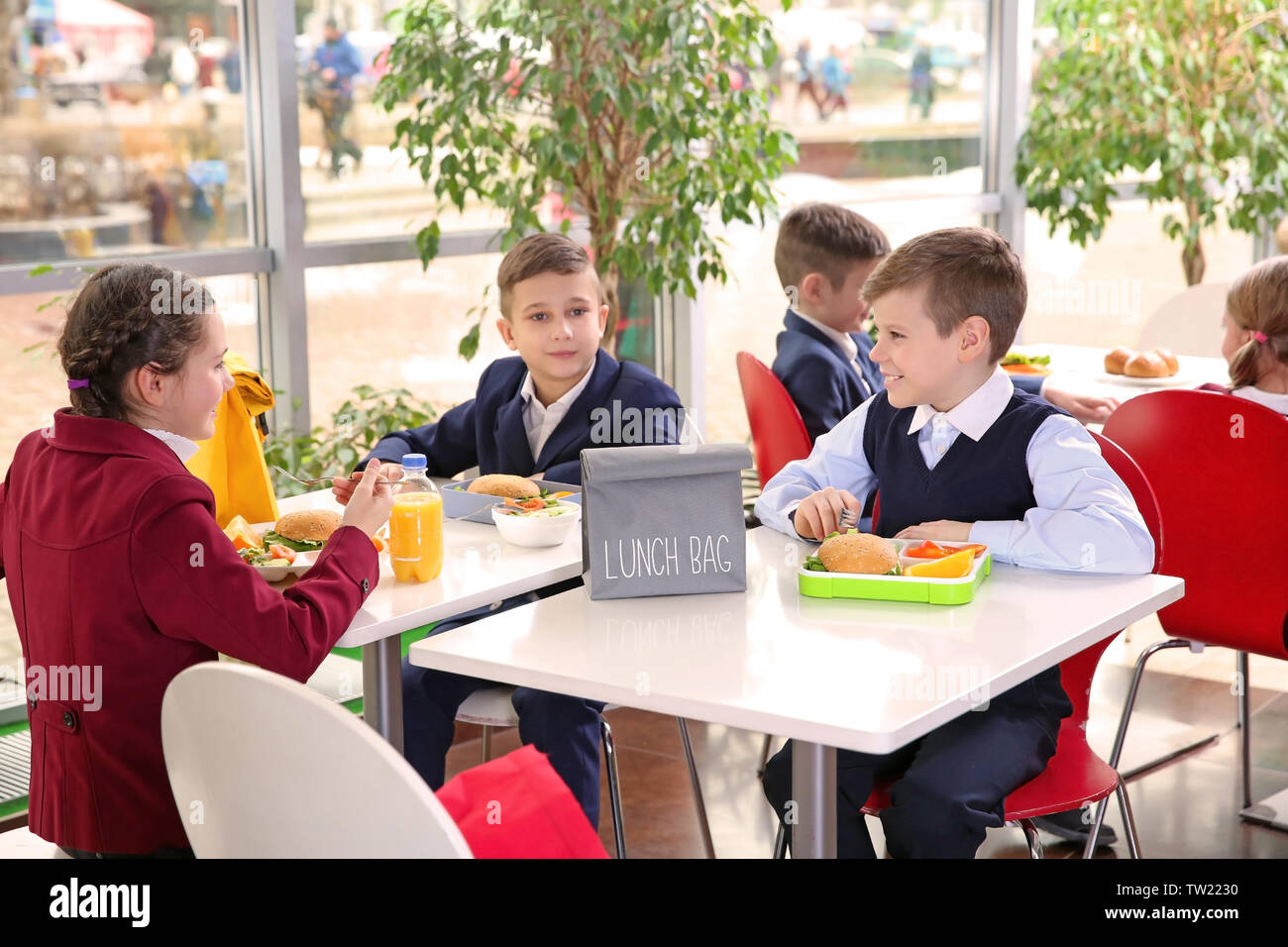 Child studying at dinner table hi-res stock photography and images - Alamy