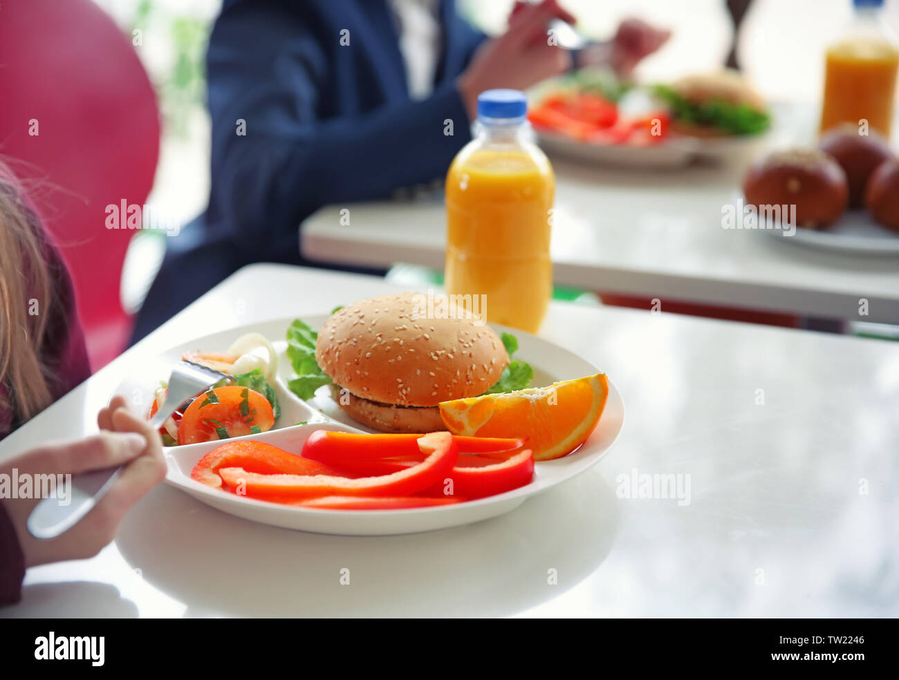 Child studying at dinner table hi-res stock photography and images - Alamy