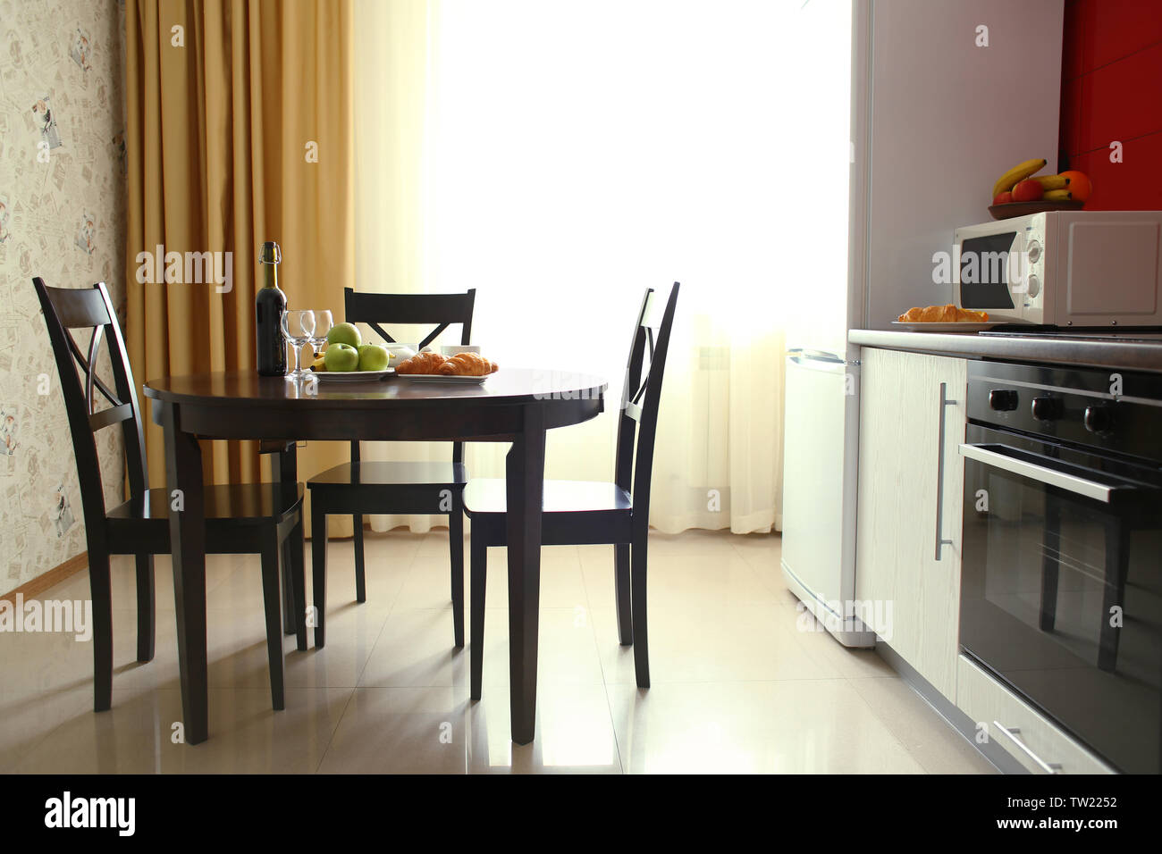 Modern interior of kitchen room with large shiny window and wooden ...