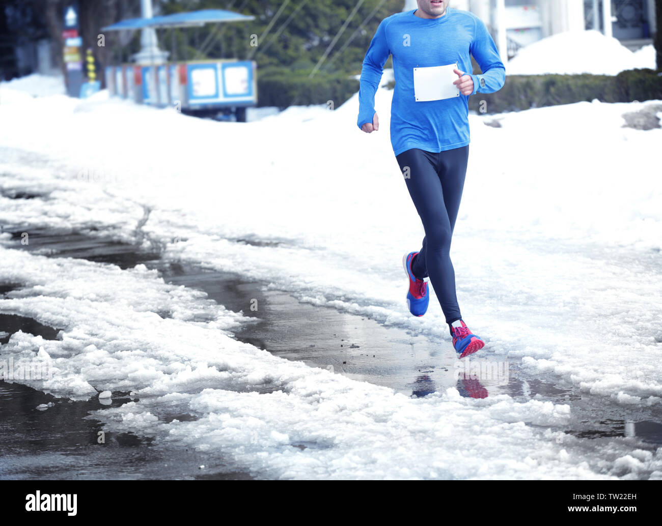 Marathon race on winter street Stock Photo - Alamy