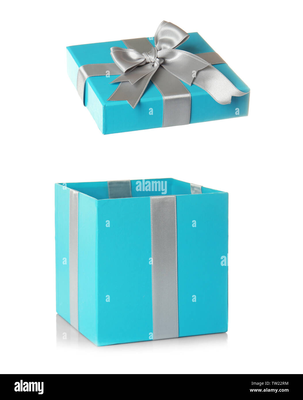 Open turquoise gift box with silver ribbon on white background Stock ...