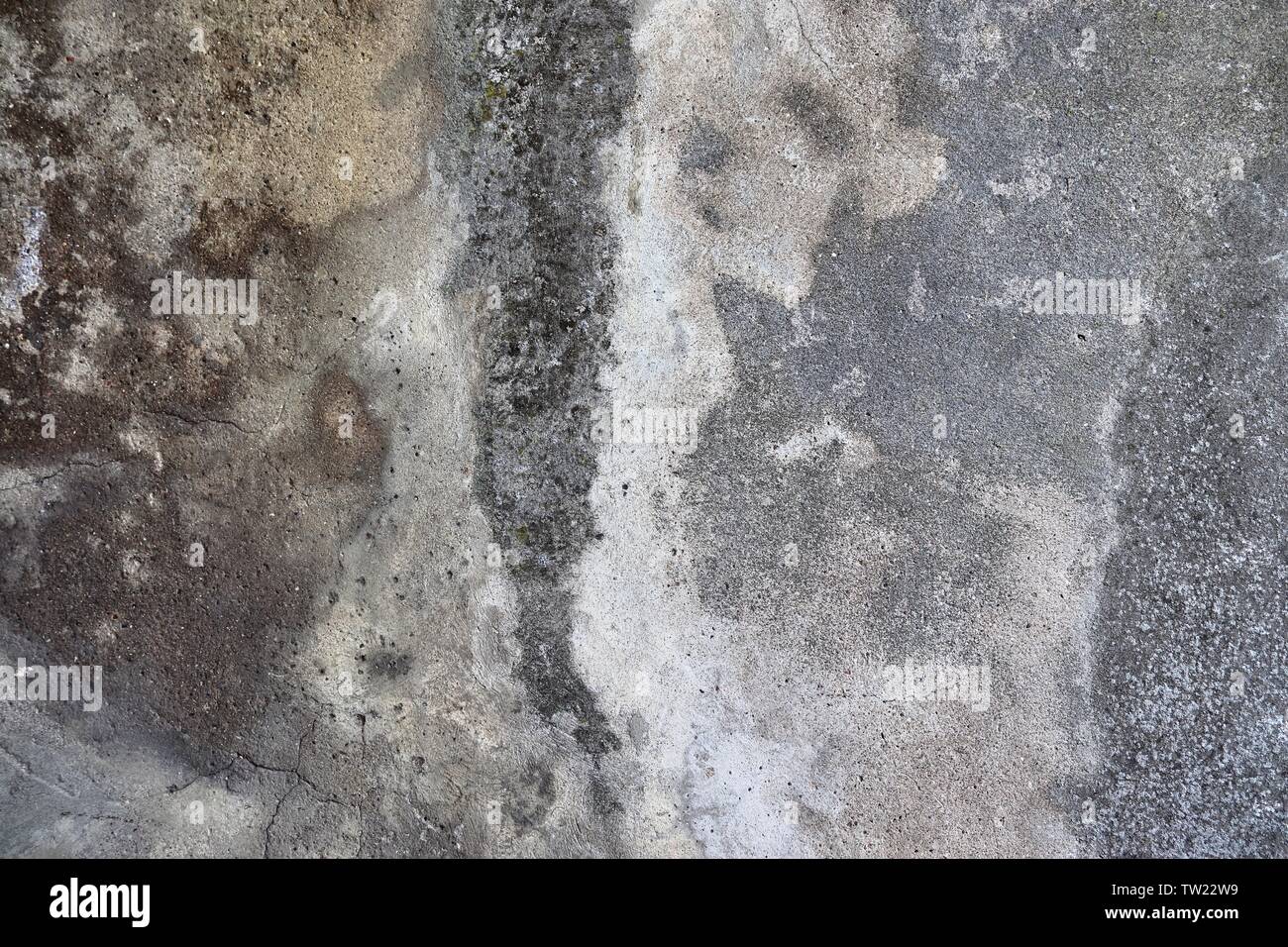 Detailed close up surface of aged and weathered concrete wall textures ...