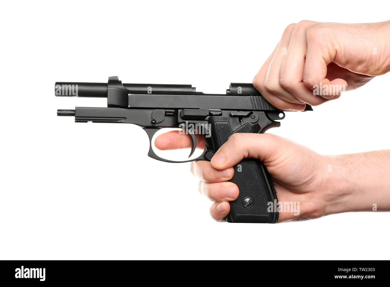 Man's hands reloading gun on white background Stock Photo - Alamy